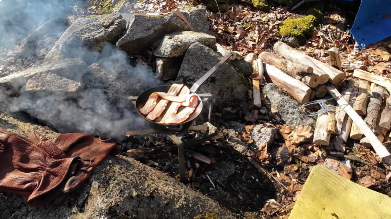 Petromax 8' wrought-iron pan and cooking grate - camp cooking perfection