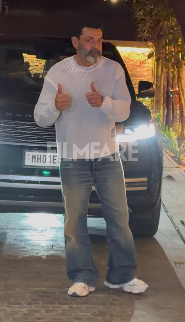 Photos: Bobby Deol interacts with paparazzi as he arrives with family ...
