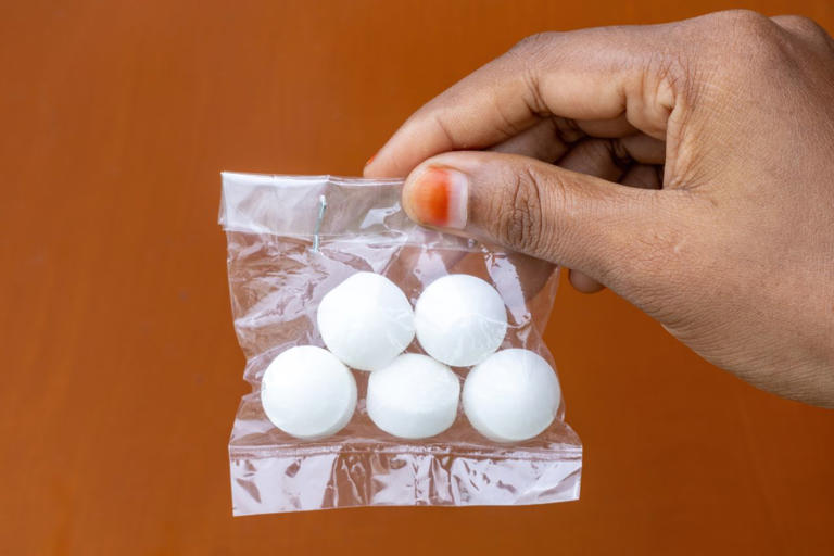 Do mothballs actually keep spiders away? We asked pest control pros