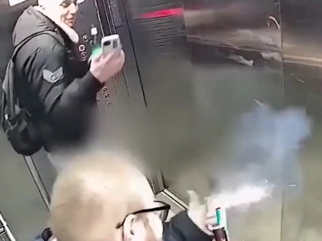 Reckless men set off fireworks in an elevator