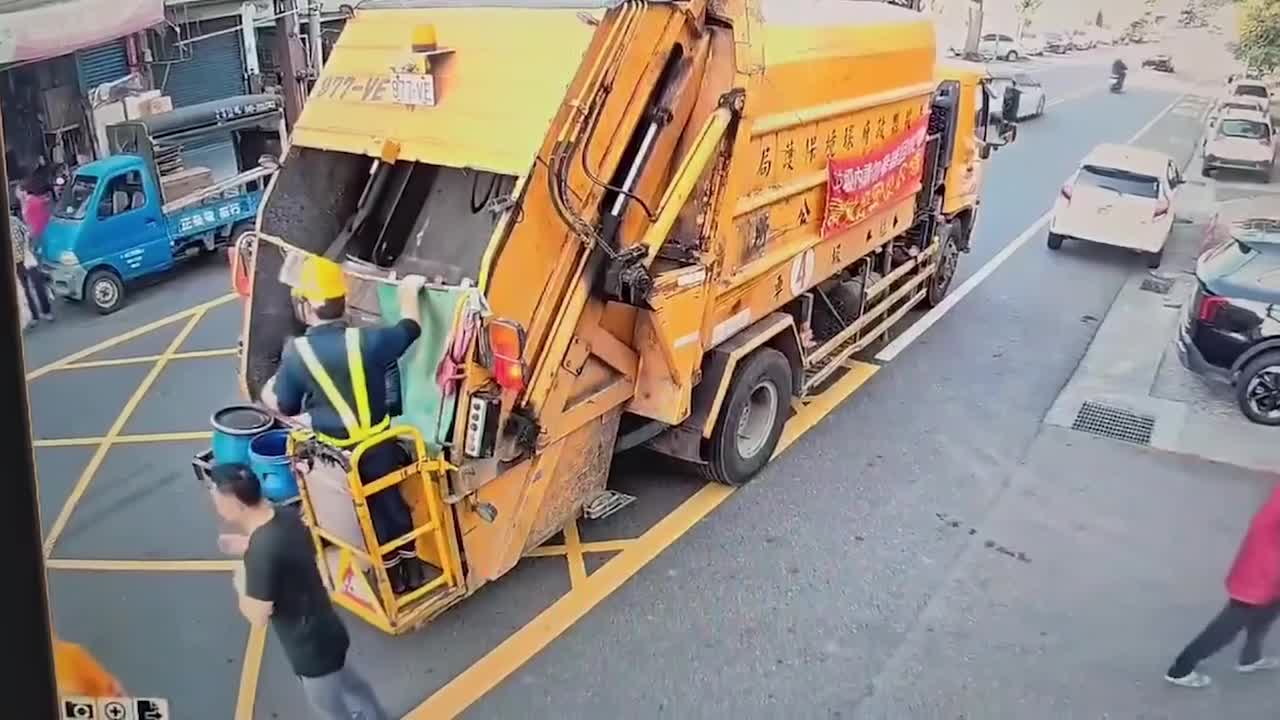 Bag of rubbish explodes as dustbin man throw it into truck