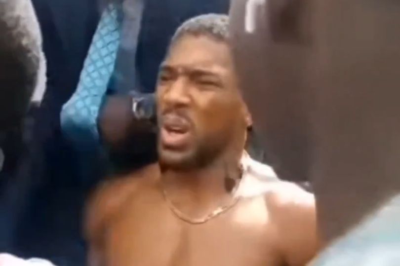 Anthony Joshua pictured stunned and injured inside mangled car after ...
