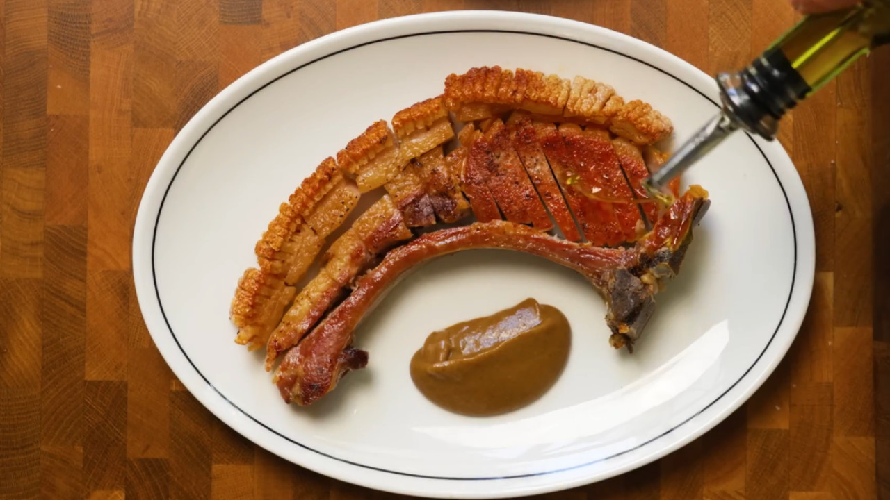 Golden, crispy skin pork chop on the BBQ
