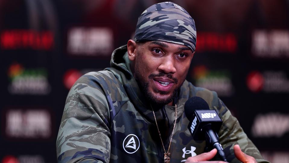 Boxer Anthony Joshua injured in car crash in Nigeria that killed two others