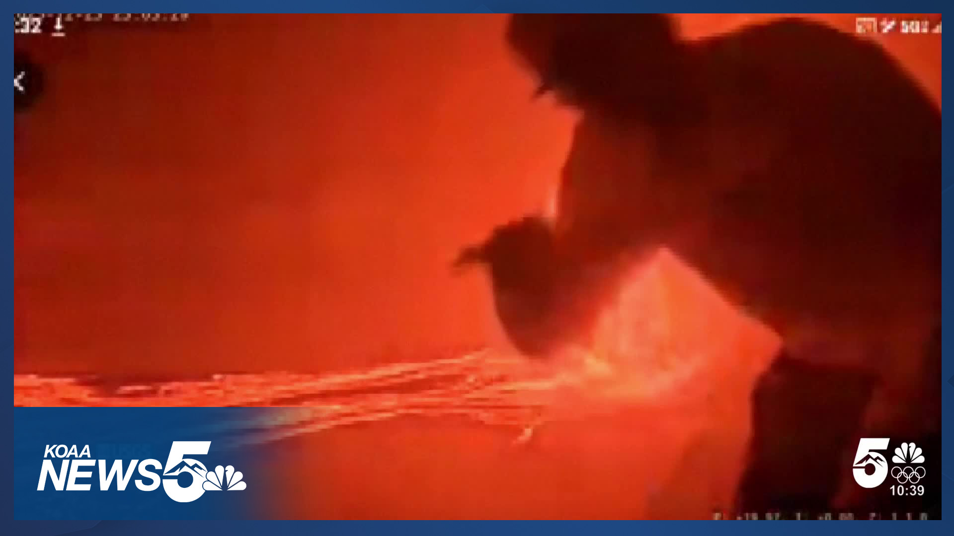 Man waves shaka in front of volcano livestream in Hawaii