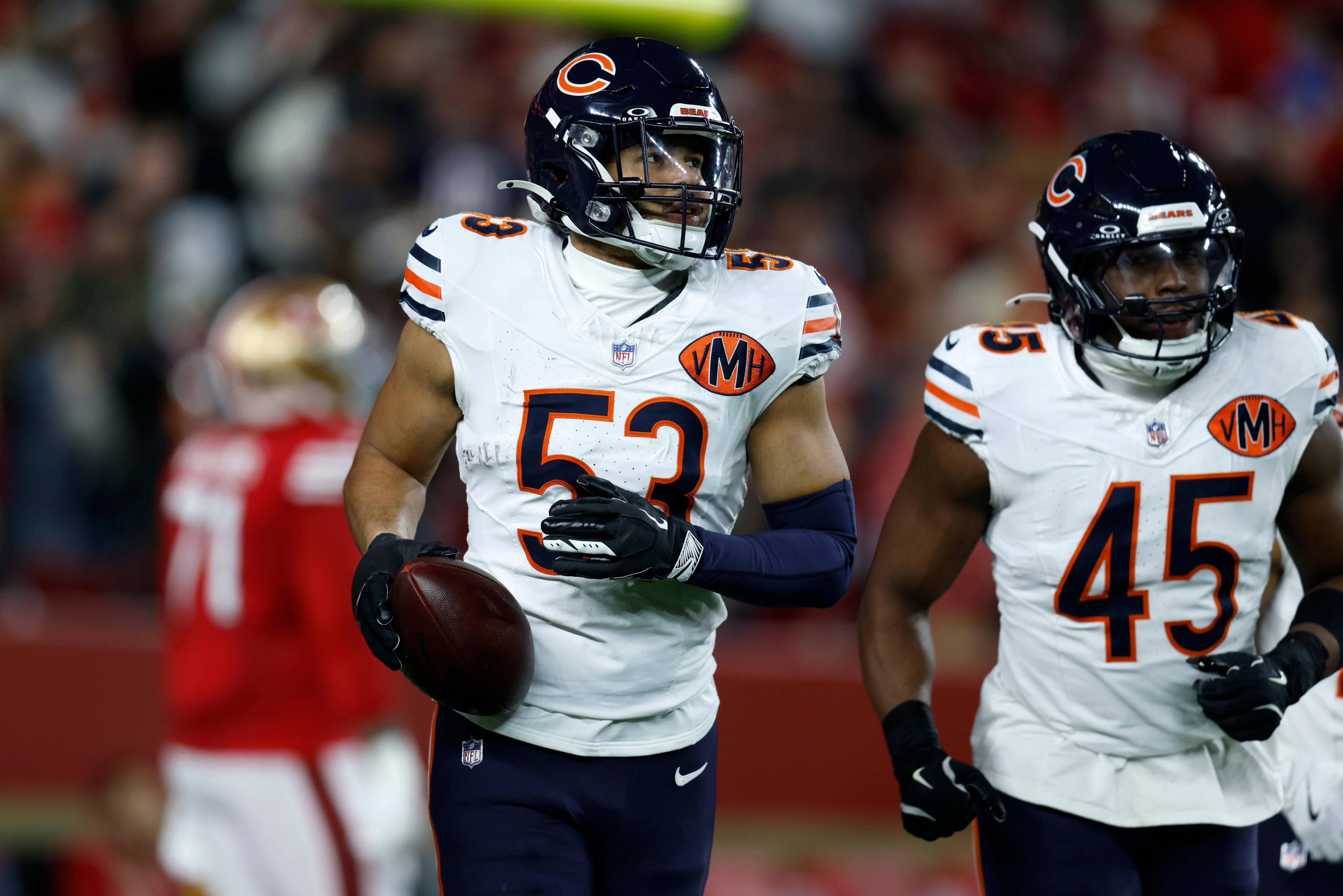 Former Badger linebacker snags pick-six on first play of the game