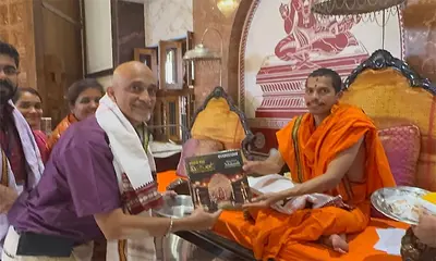 Coffee table book 'Udupi Kanda Mukunda' presented to Partagali Math pontiff