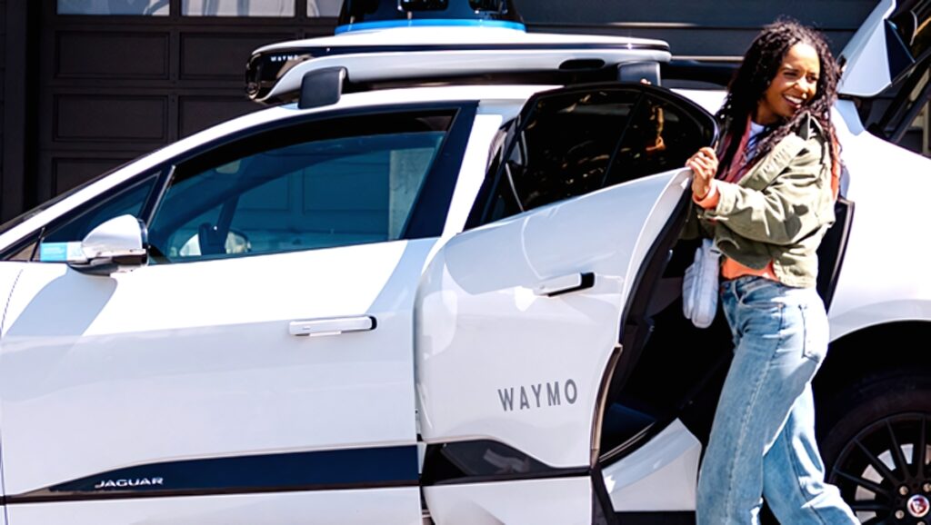 People get paid $24 just to walk up and shut a robotaxi door