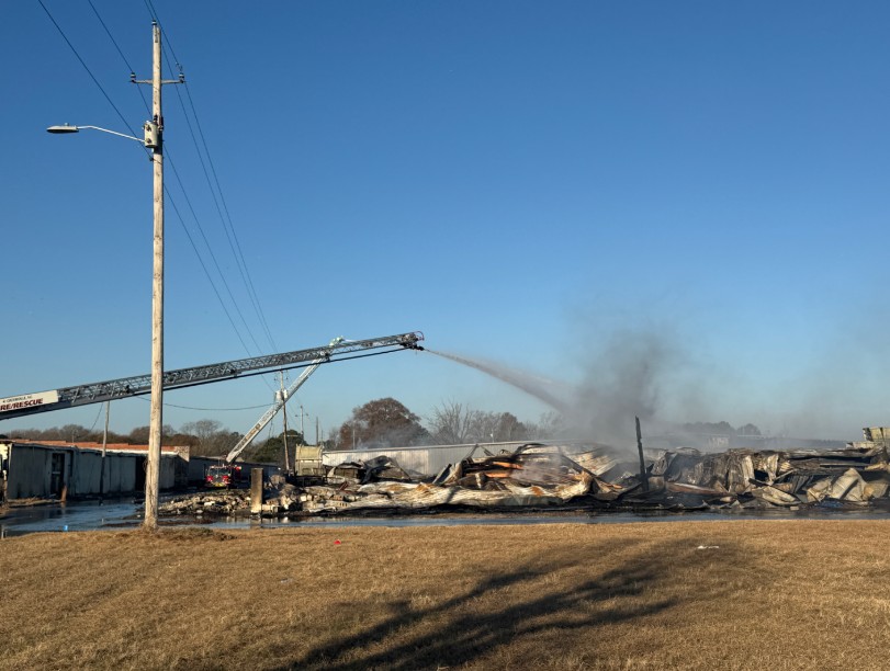 Massive fire erupts at Greenville warehouse