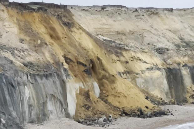 Pretty shocking: Resident captures dramatic cliff fall while out on walk
