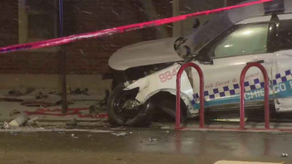 Chicago police squad car hit, wrecked by stolen car in Wrigleyville, 2 ...