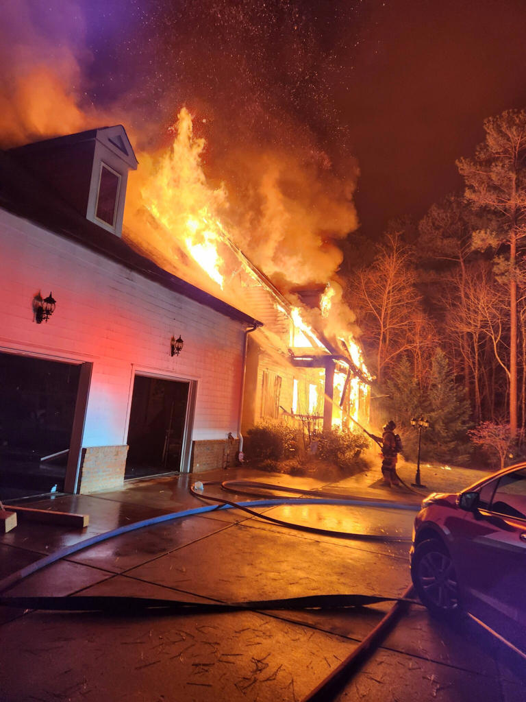 Huge fire at house tied to star NASCAR driver leaves 1 dead, 1 hurt in ...