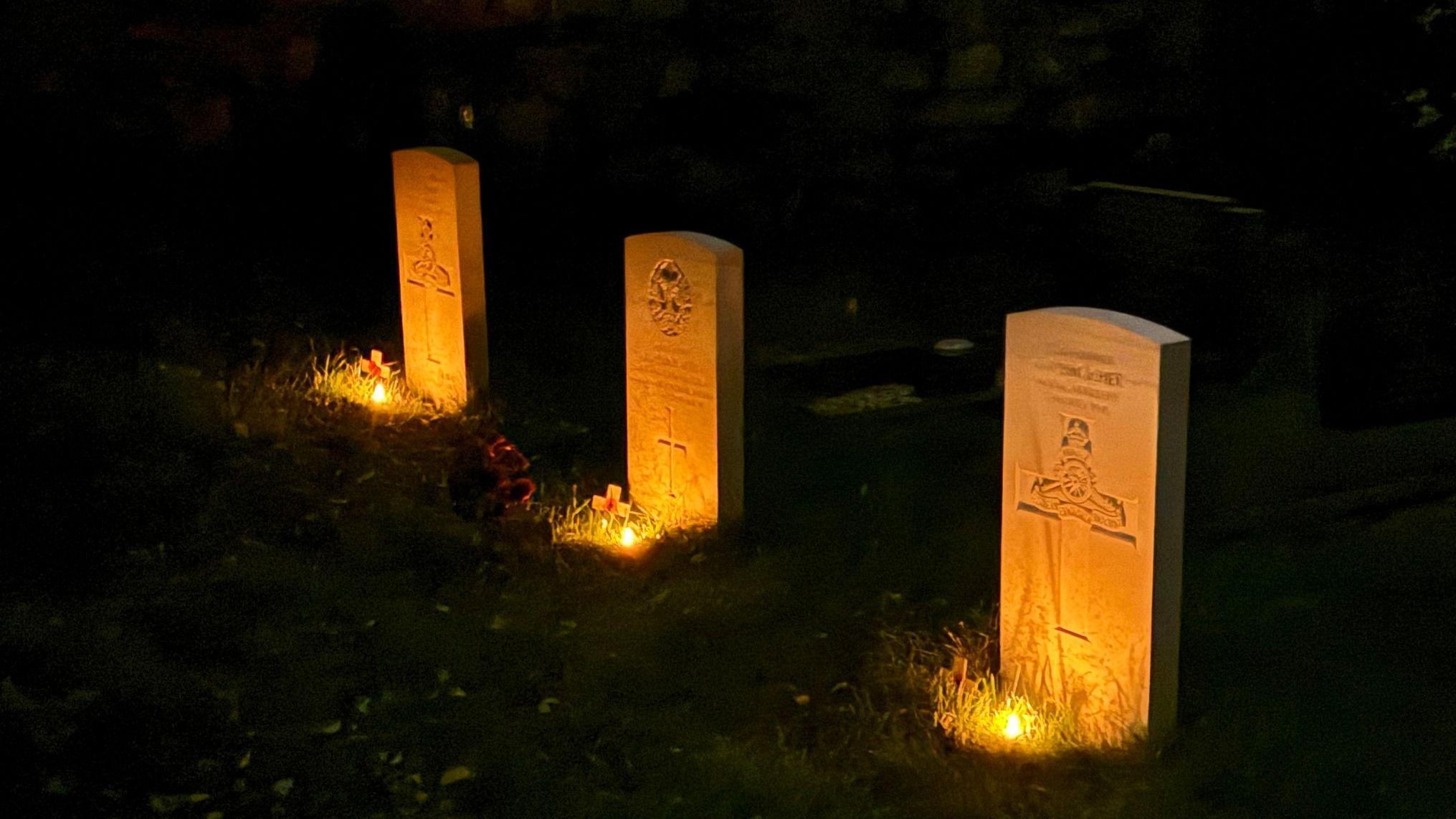 War graves lit up in Christmas tribute