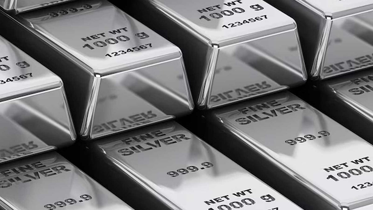 Silver drops almost 3% from record highs, gold snaps 4-day rally
