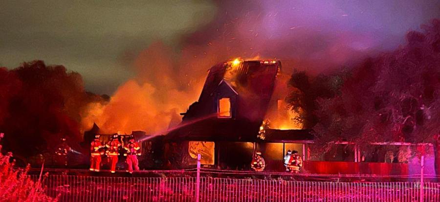 Travis County firefighters bring 2-story house fire under control