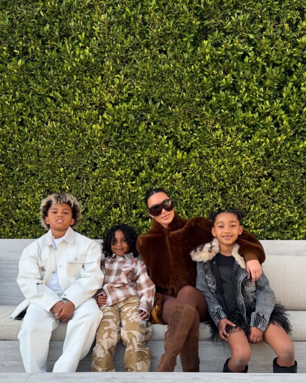 Kim Kardashian finally gets all 4 kids in sweet Christmas snaps after ...