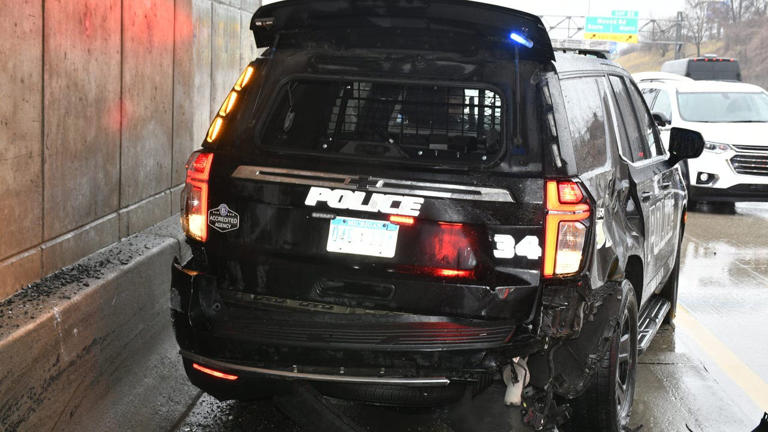 Stopped Warren police cruiser crashed into by SUV on 696
