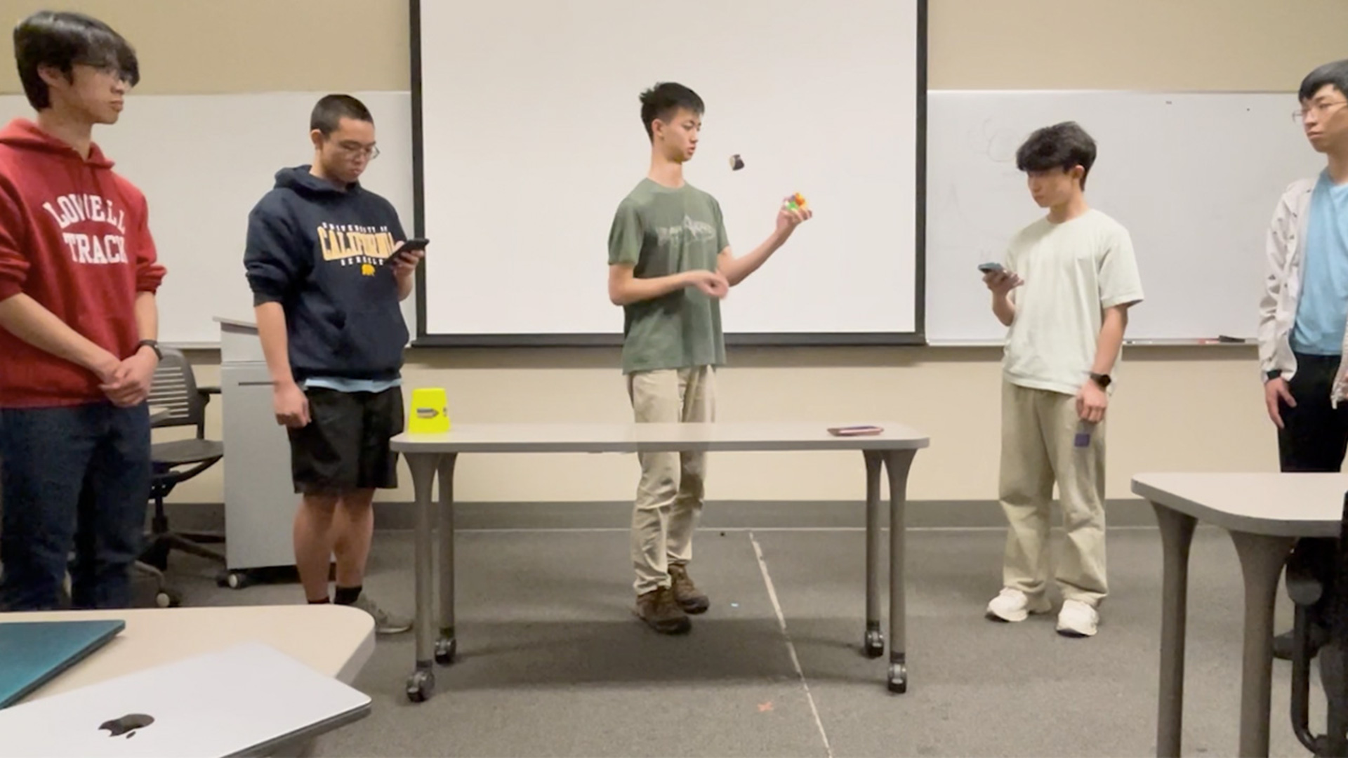 Fastest time to solve a 4x4x4 rotating puzzle cube whilst juggling 1 ...