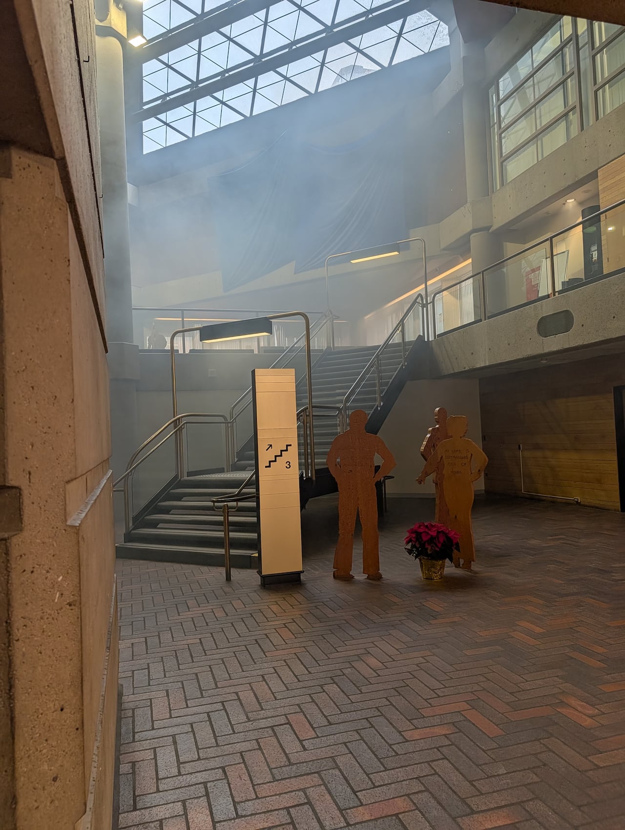Man in custody after suspected arson at federal government office ...