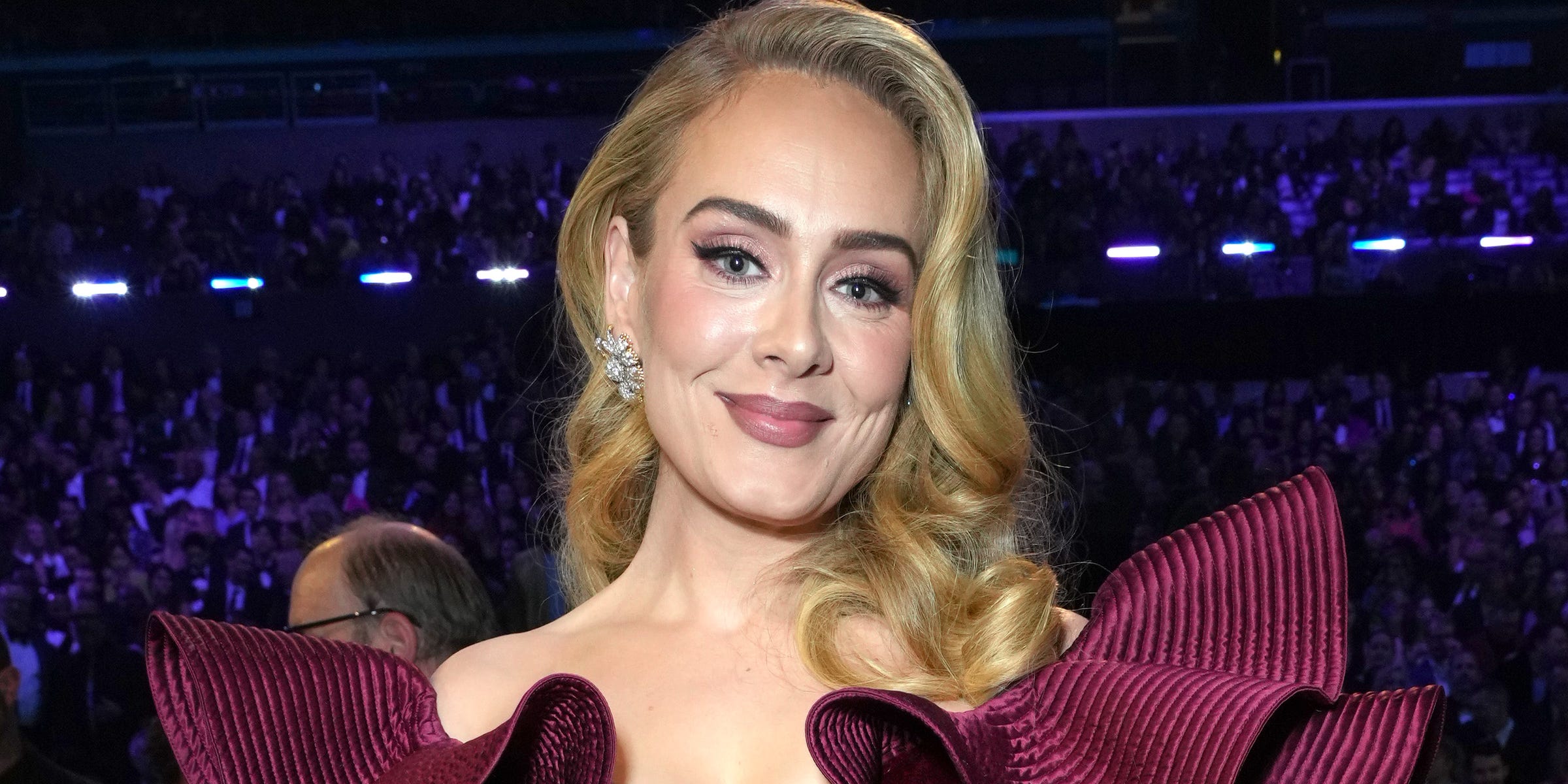 Adele makes a super-rare outing in the coziest of polo sweaters