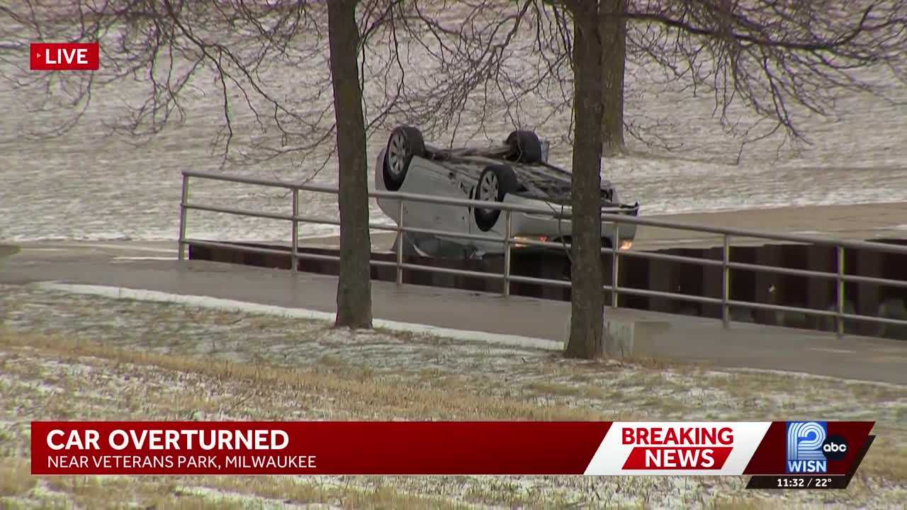 Accused 5-time drunken driver crashes, car dangles over Lake Michigan