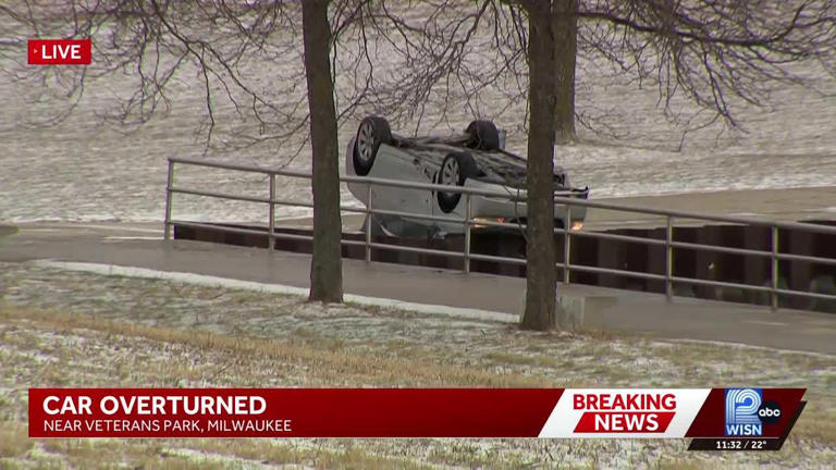 Accused 5-time drunken driver crashes, car dangles over Lake Michigan