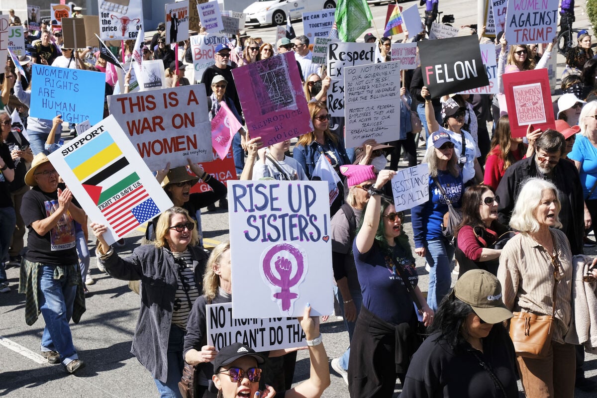 Protesters across the world rally on International Women's Day to stand ...