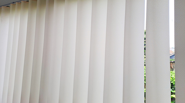 Skip cheap plastic vertical blinds: This sliding glass door covering ...