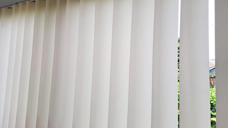 Skip cheap plastic vertical blinds: This sliding glass door covering ...