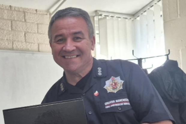 Oldham firefighter given MBE for work with burn victims