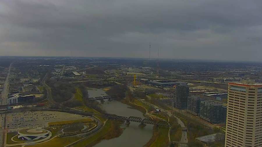 Wind gusts slowly decreasing with frigid air remaining