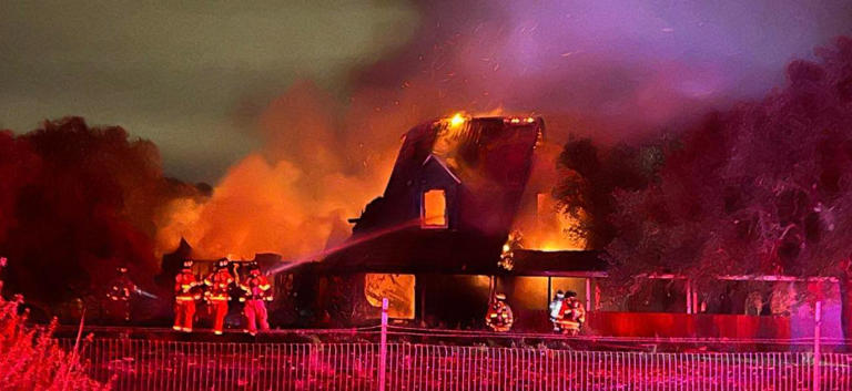 Travis County firefighters bring 2-story house fire under control