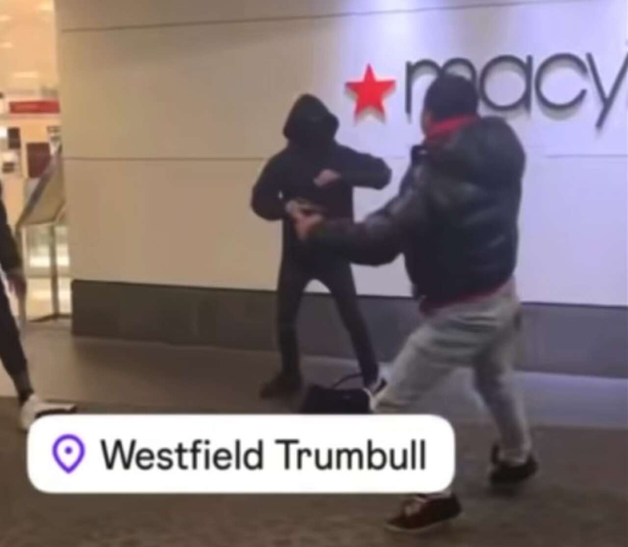 Video shows masked gunman fire shot inside Trumbull Mall