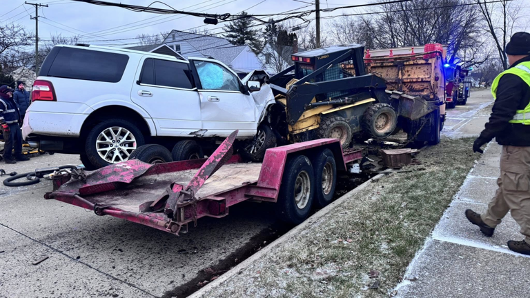 Stopped Warren police cruiser crashed into by SUV on 696