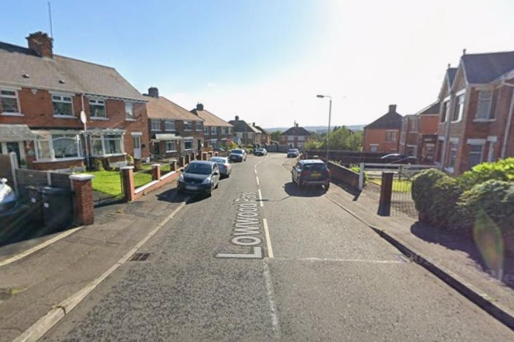 Belfast house attack sees brick thrown through window and door set alight