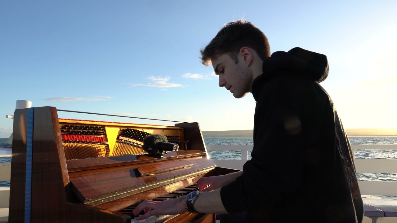 Playing a medley on a rented boat