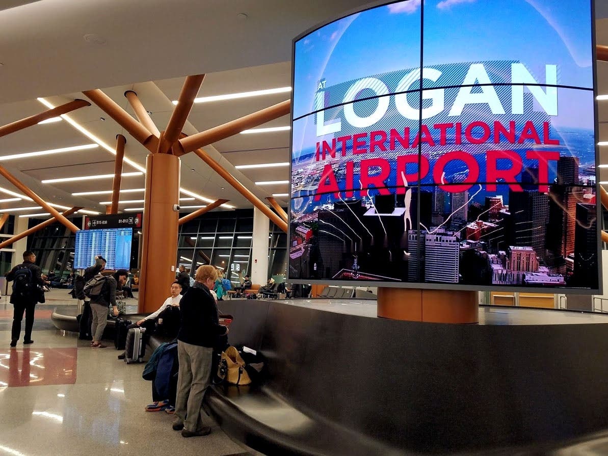 Boston Logan socked with winter weather, dozens of flights canceled