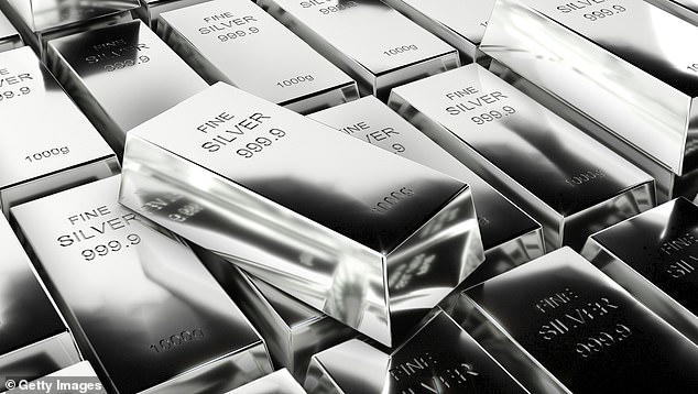 Silver hits new high of more than $80 an ounce before crashing back ...