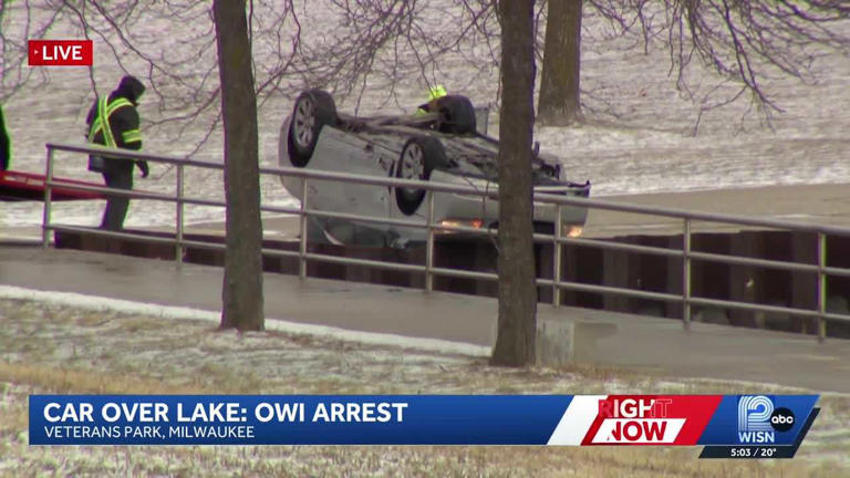 Accused 5-time drunken driver crashes, car dangles over Lake Michigan