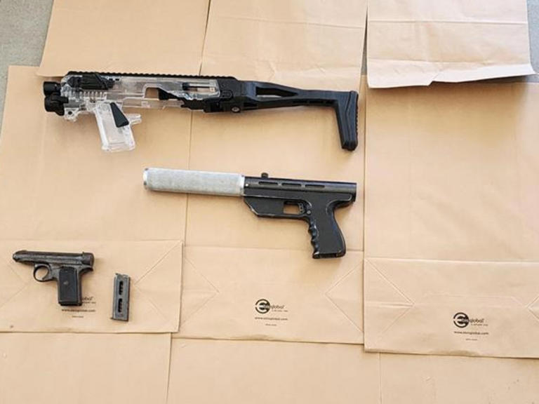 Six charged in massive firearm bust