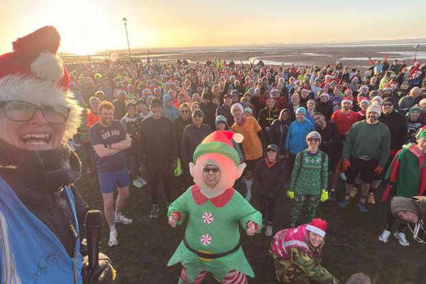 Hundreds of runners take part in festive parkrun on Christmas Day in ...
