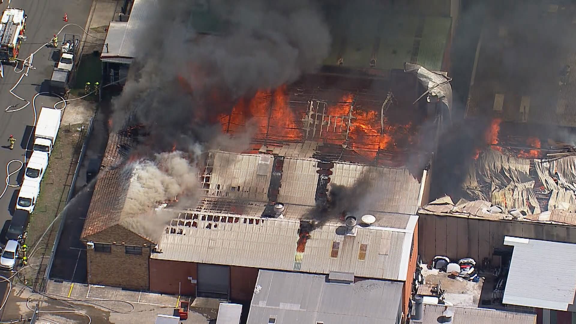 More than 60 firefighters work to extinguish factory fire in Sydney's west