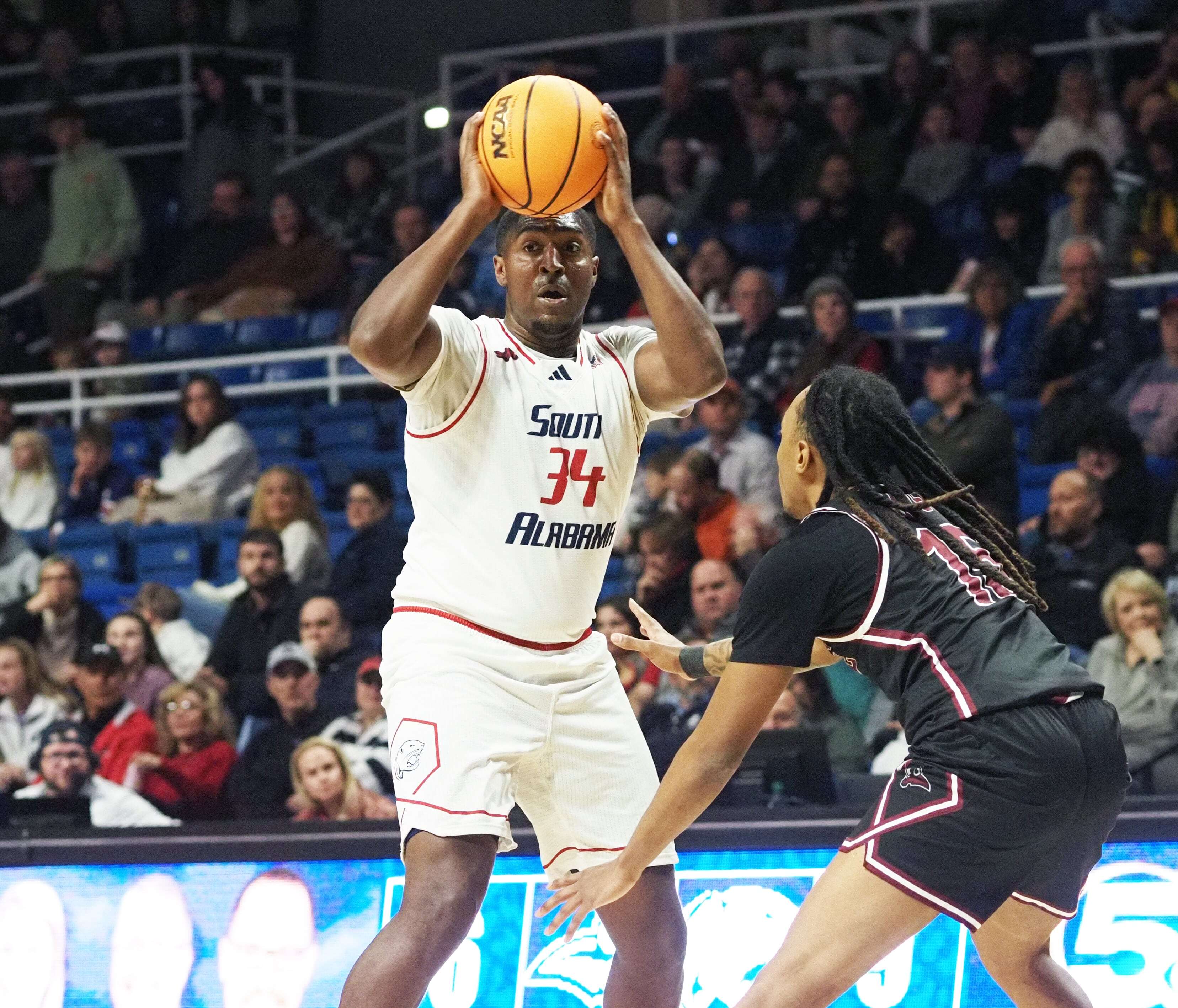 Short-handed South Alabama basketball powers past Mobile, 85-52