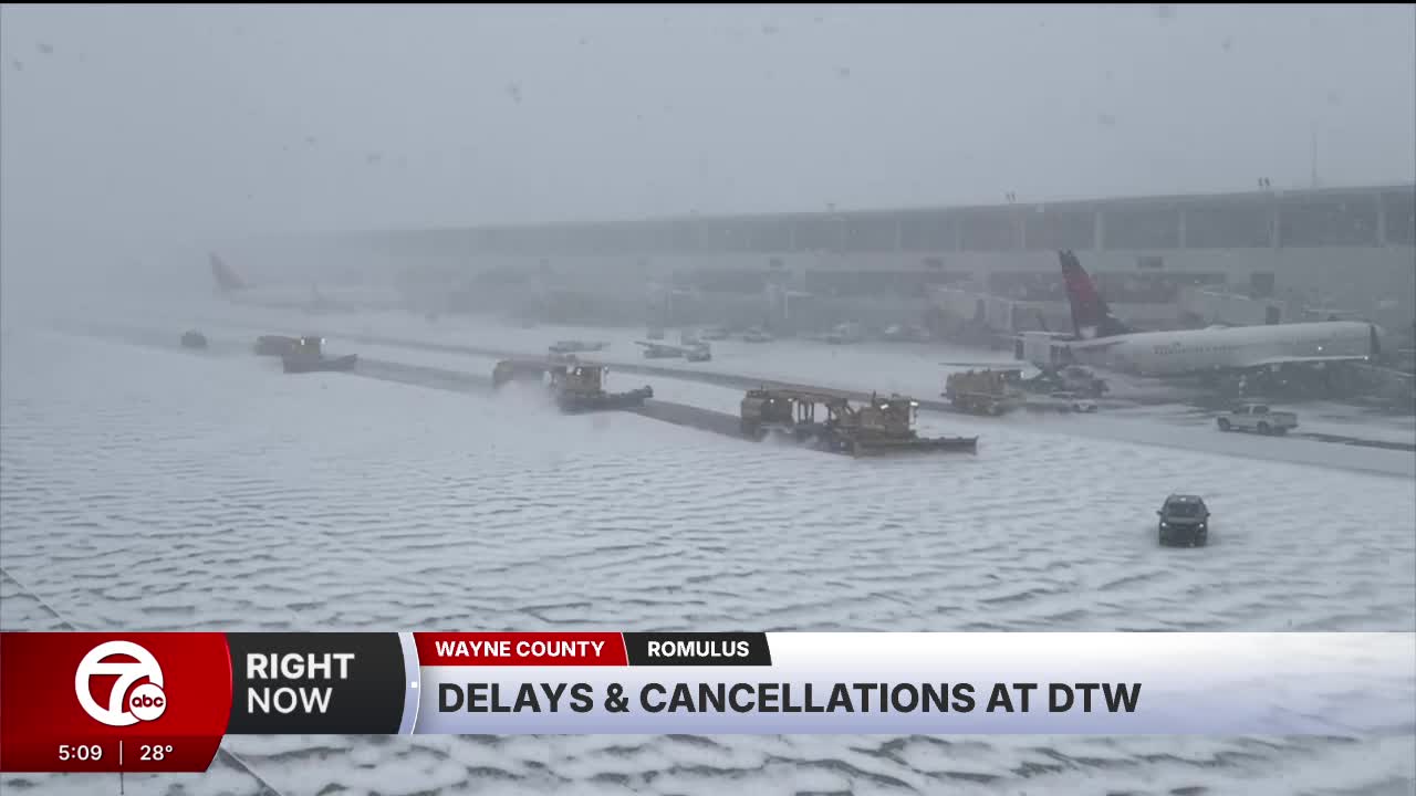 Snow storm grounds flights at Detroit Metro Airport as bomb cyclone ...