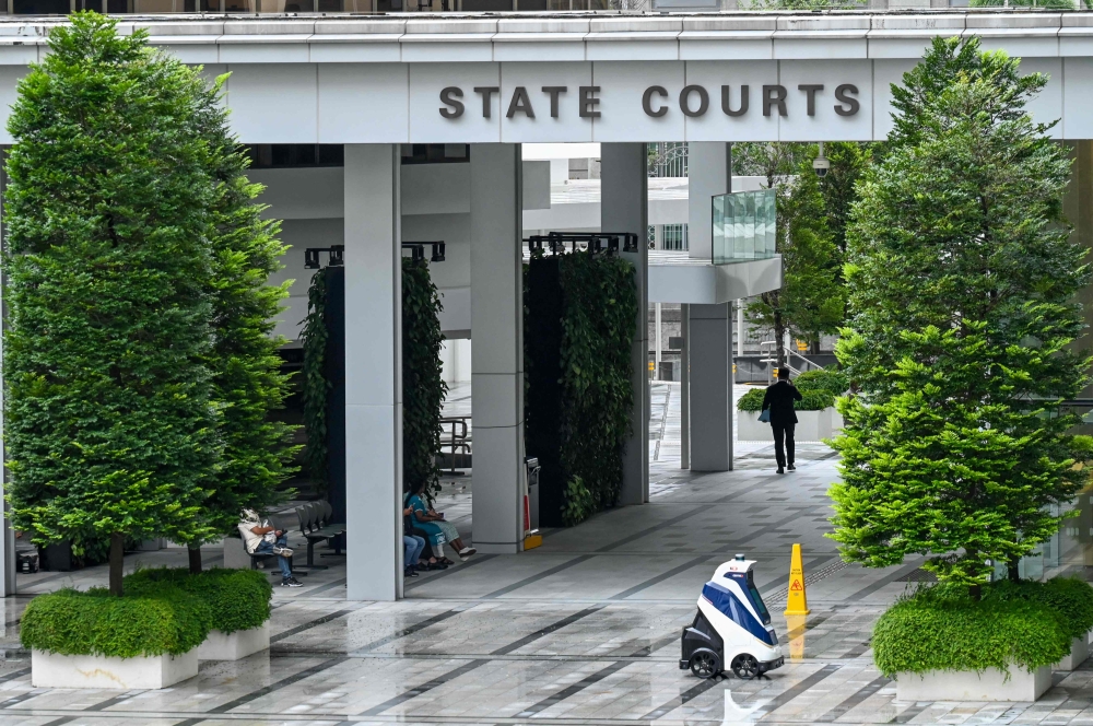 Singapore court bites back with jail term over gruesome office fight