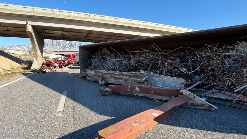 Truck loses load of steel beams after rolling over on I-215 near I-15 ...