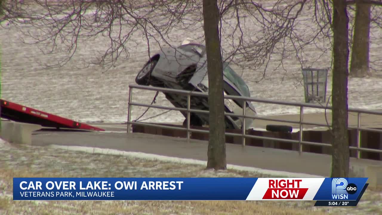 Accused 5-time drunken driver crashes, car dangles over Lake Michigan