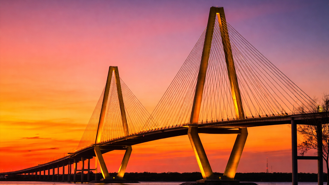 Golden bridge over a vibrant sunset