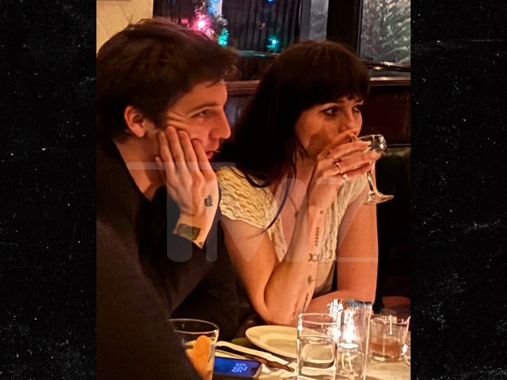 Dakota Johnson and Role Model seen getting cozy together at dinner in LA