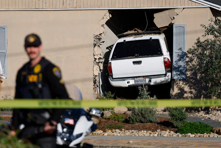 Husband detained after allegedly driving into Bay Park home where wife ...